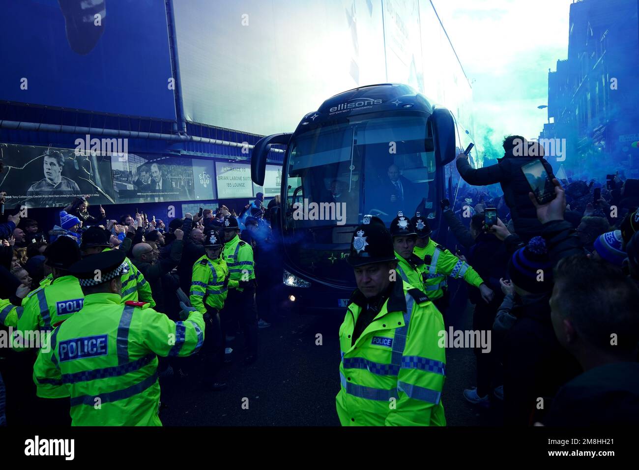Fans line the roads as the teams arrive prior to the Premier League ...