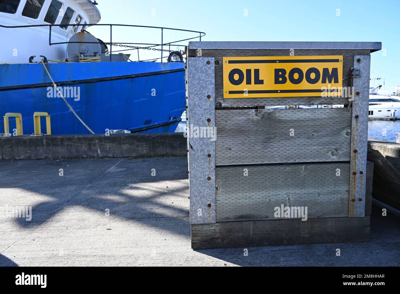 oil boom diesel pump in port dock to supply ships blue color Stock ...