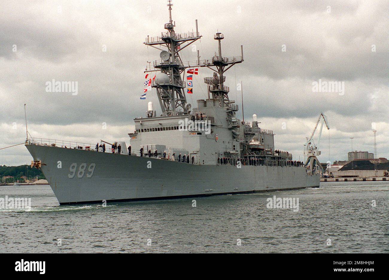 A port bow view of the destroyer USS DEYO (DD-989) arriving in port during Exercise Baltops '93 ...