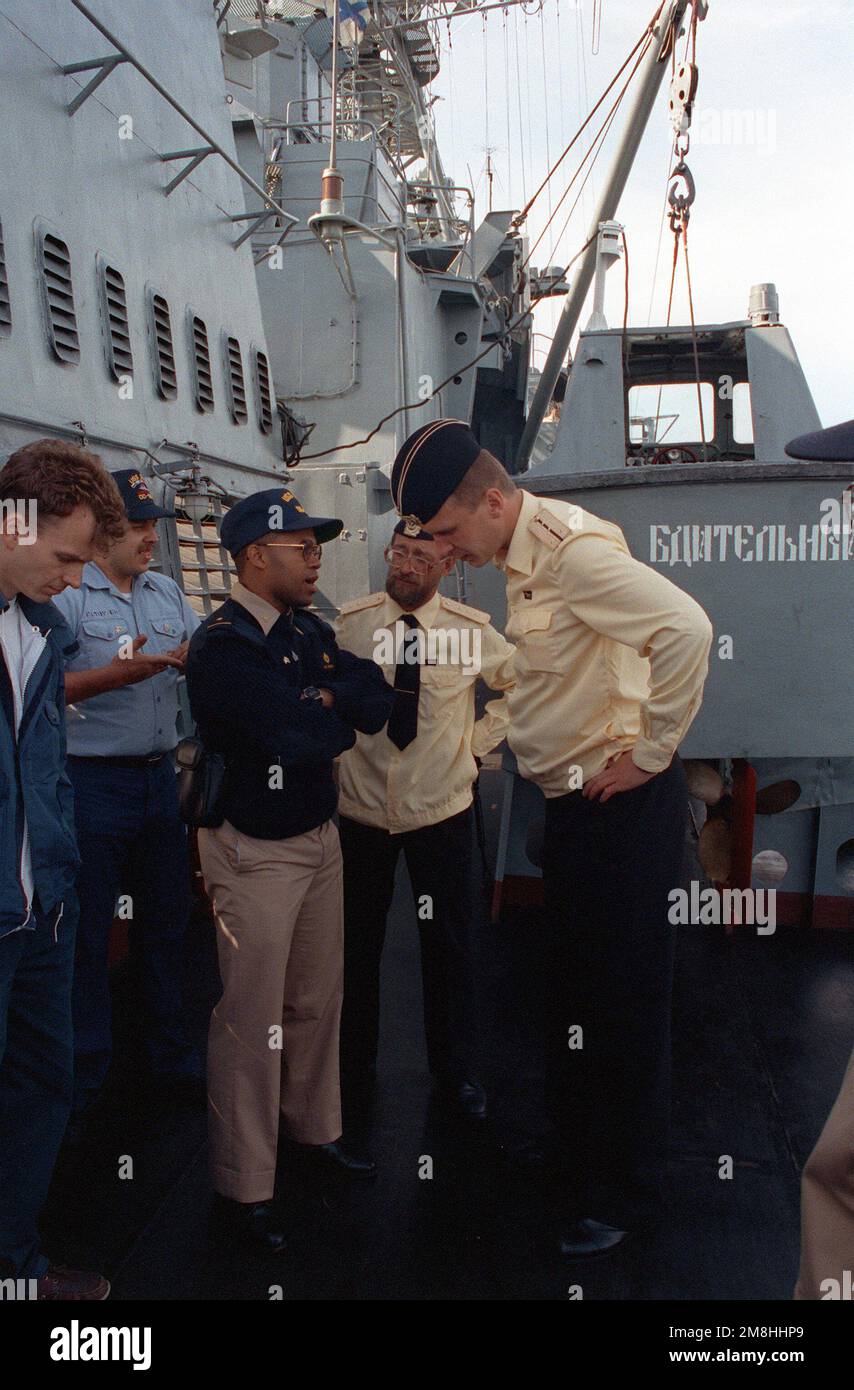 Midshipman 1ST Class Michael Nelms serves as an interpreter for USS ...