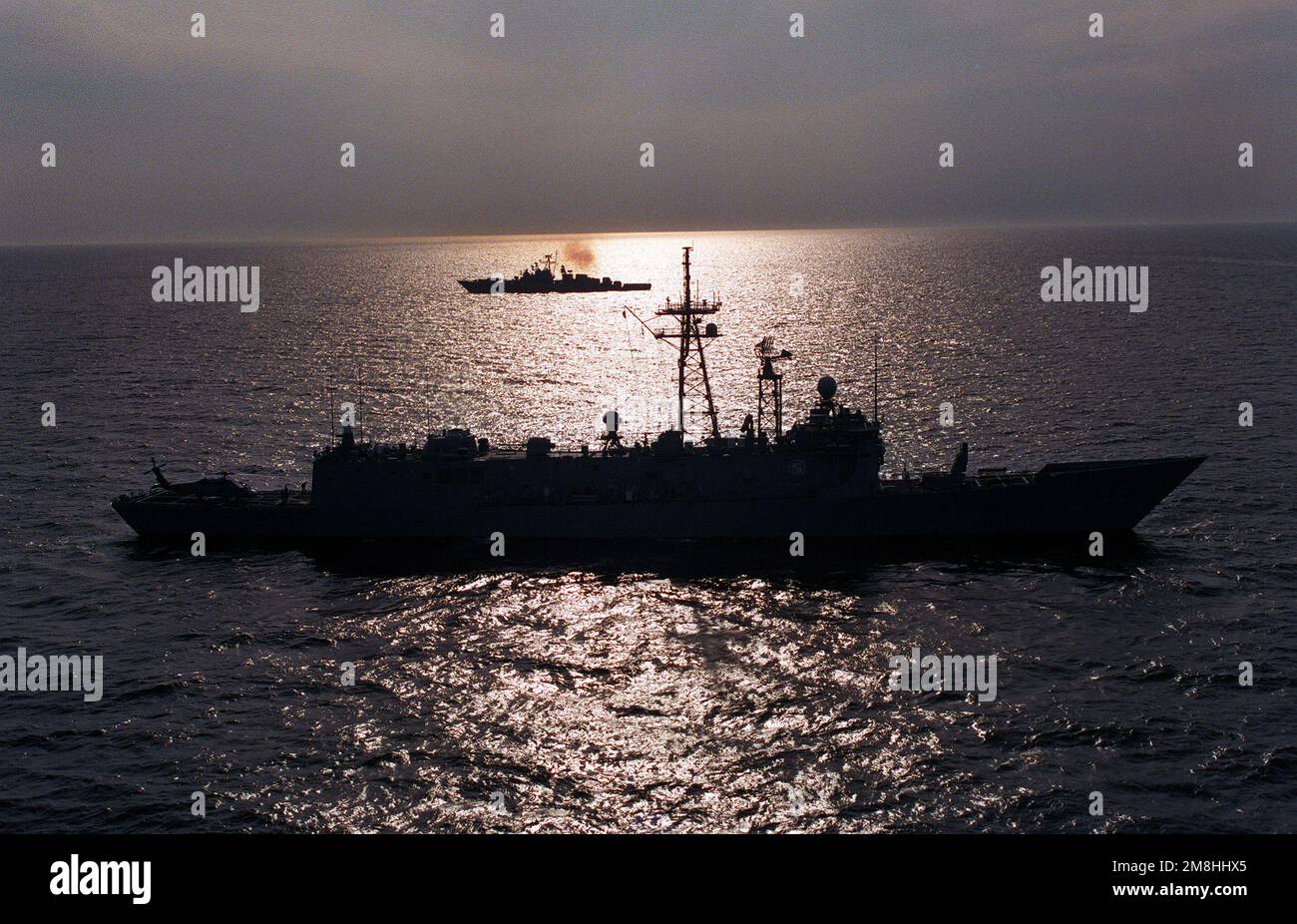 A starboard beam view of the guided missile frigate USS DOYLE (FFG-39 ...