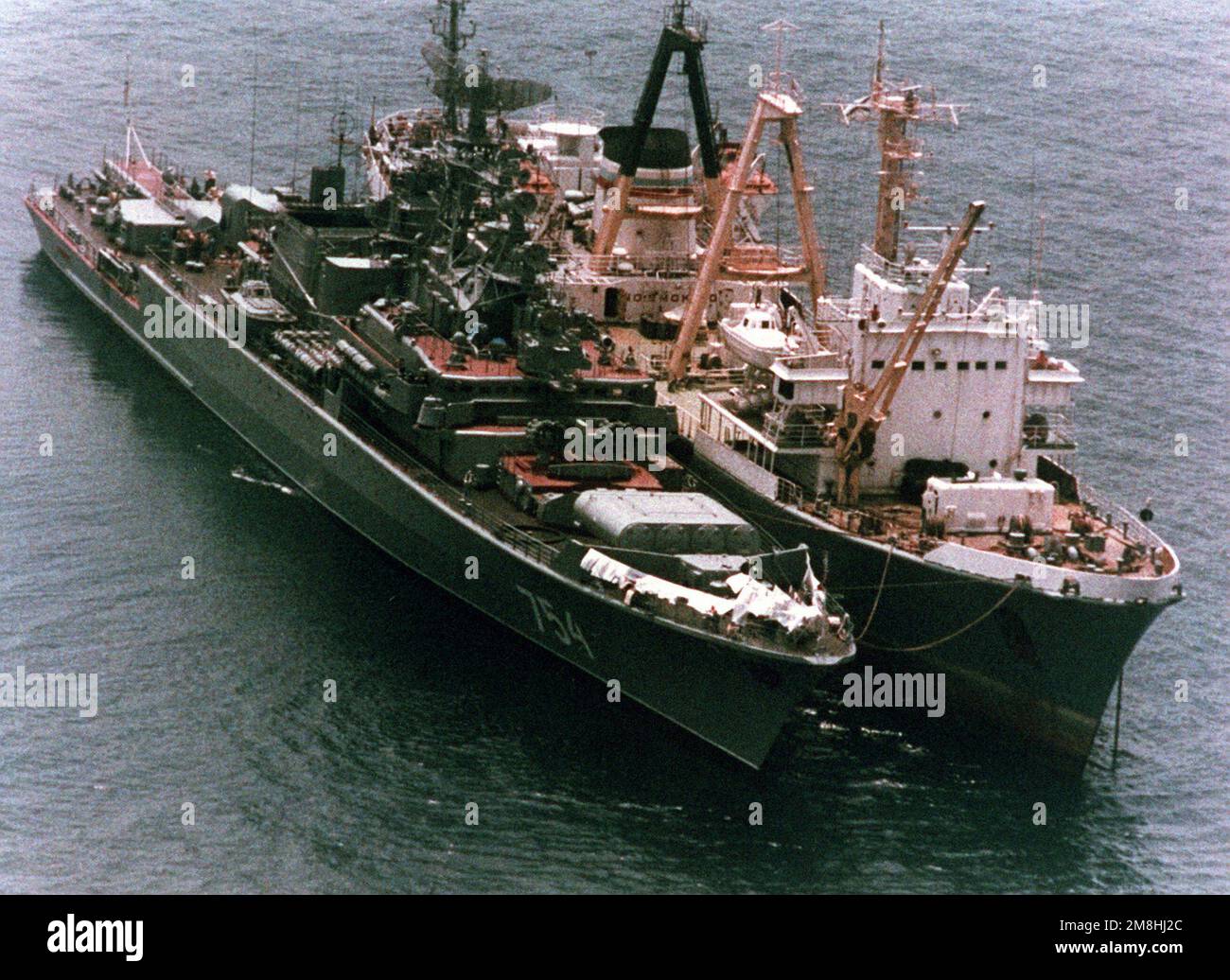 A starboard bow view of the Krivak I-class DRUZHNY alongside a Uda ...