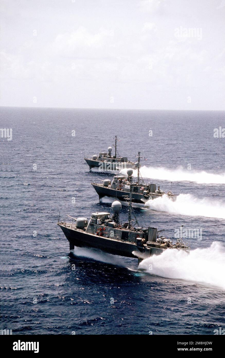 Hydrofoils of Patrol Combatant Missile Hydrofoil Squadron 2 travel in ...