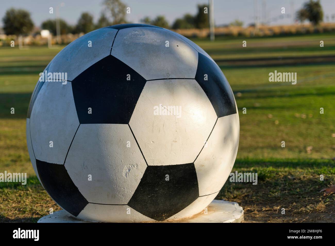 A closeup of a soccer ball made of cement. Bakersfield, California, USA ...