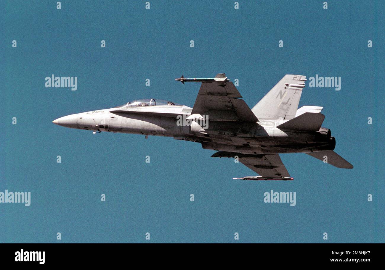 A Strike Fighter Squadron 125 (VFA-125) F/A-18D Hornet aircraft ascends ...