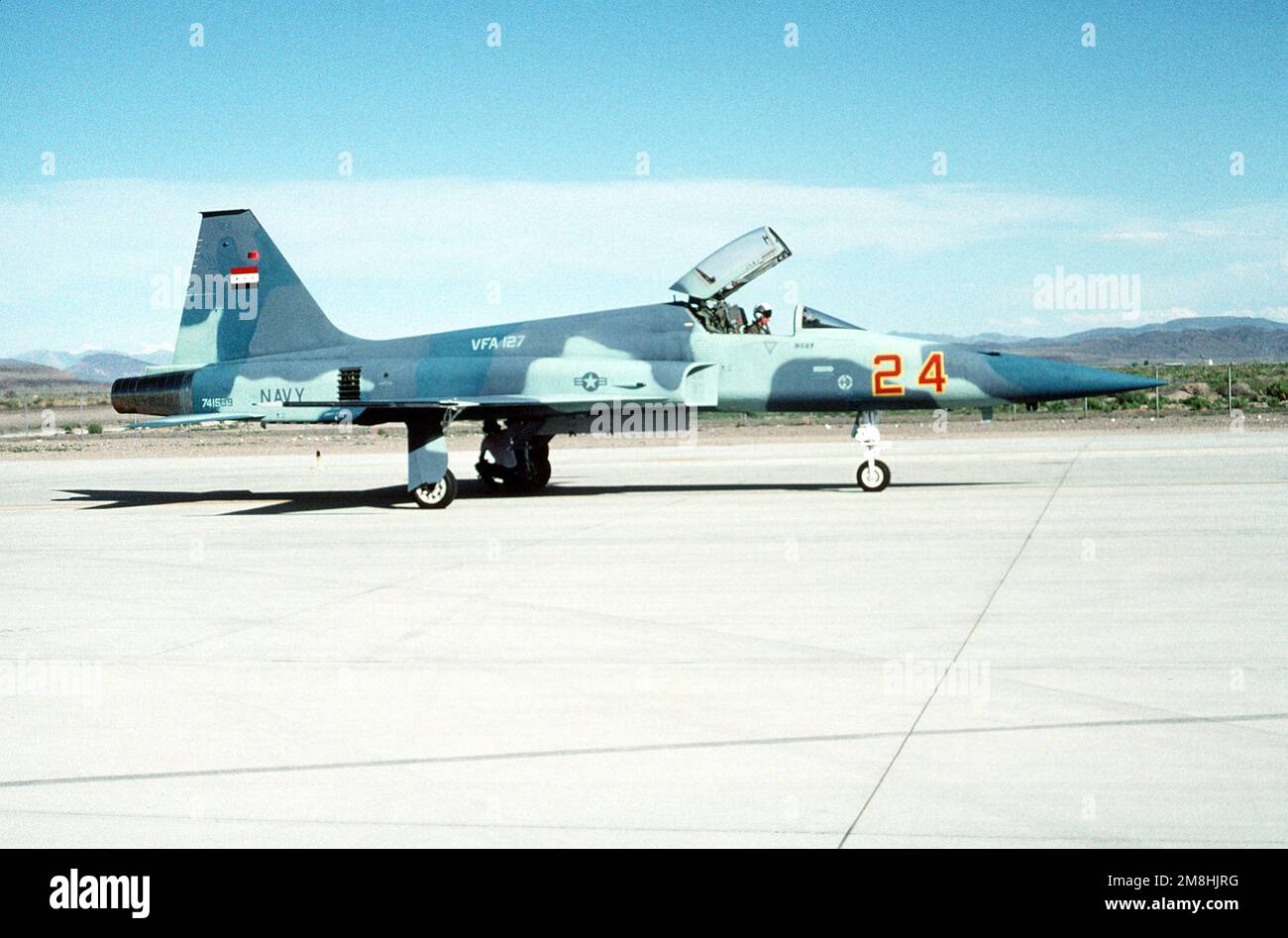 A Strike Fighter Squadron 127 (VFA-127) F-5E Tiger II aircraft receives ...
