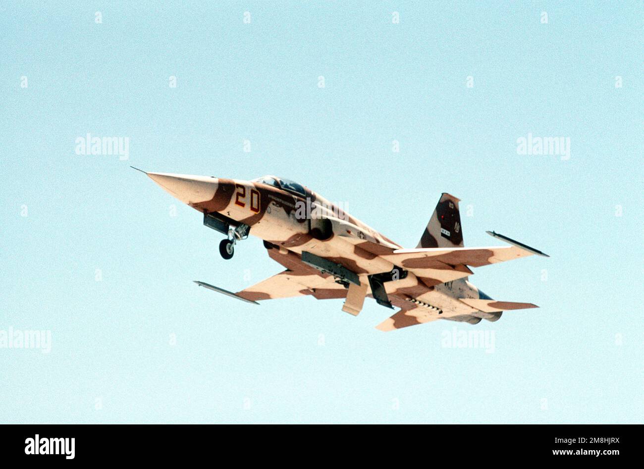 An underside view of a Strike Fighter Squadron 127 (VFA-127) F-5E Tiger ...