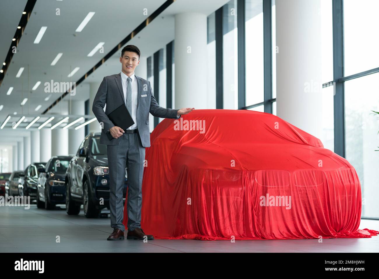Business young men work in 4 s shop Stock Photo - Alamy