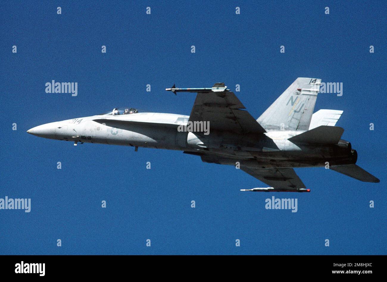 A Strike Fighter Squadron 125 (VFA-125) F/A-18A Hornet aircraft armed ...
