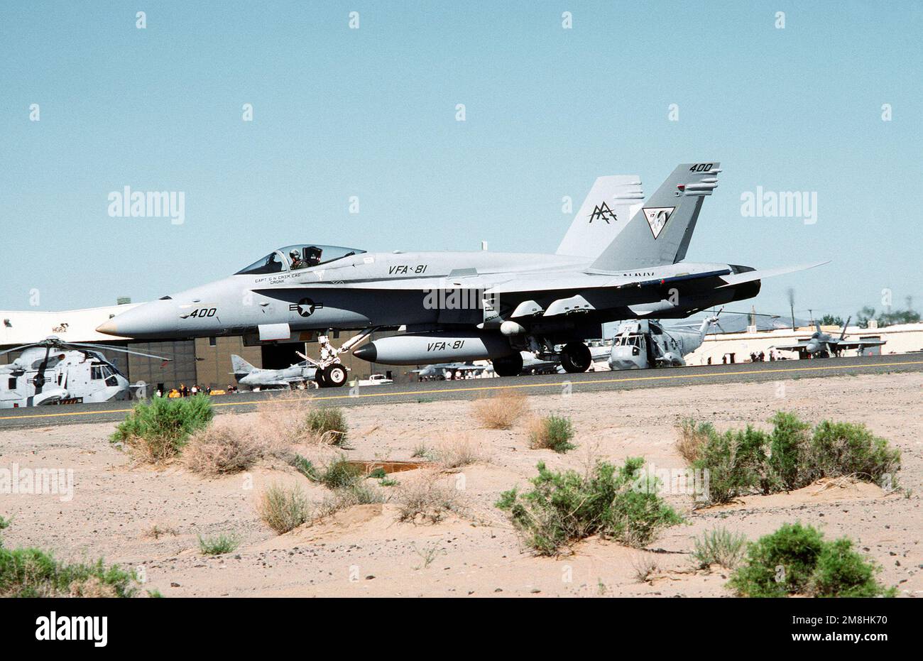 A Strike Fighter Squadron 83 (VFA-83) F/A-18C Hornet aircraft taxis on ...