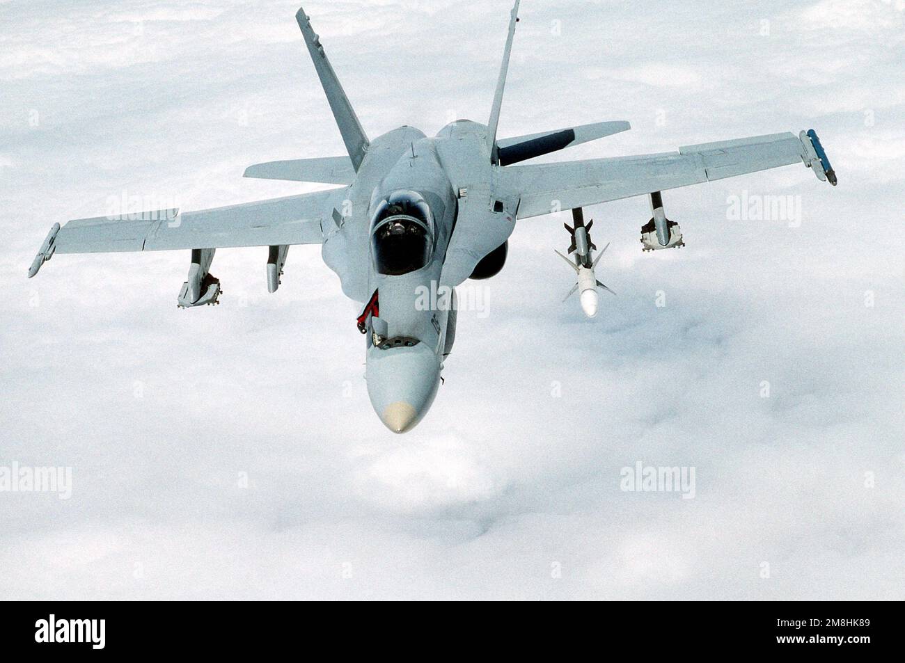 An air-to-air front view of a Marine Fighter Attack Squadron 321 (VMFA ...