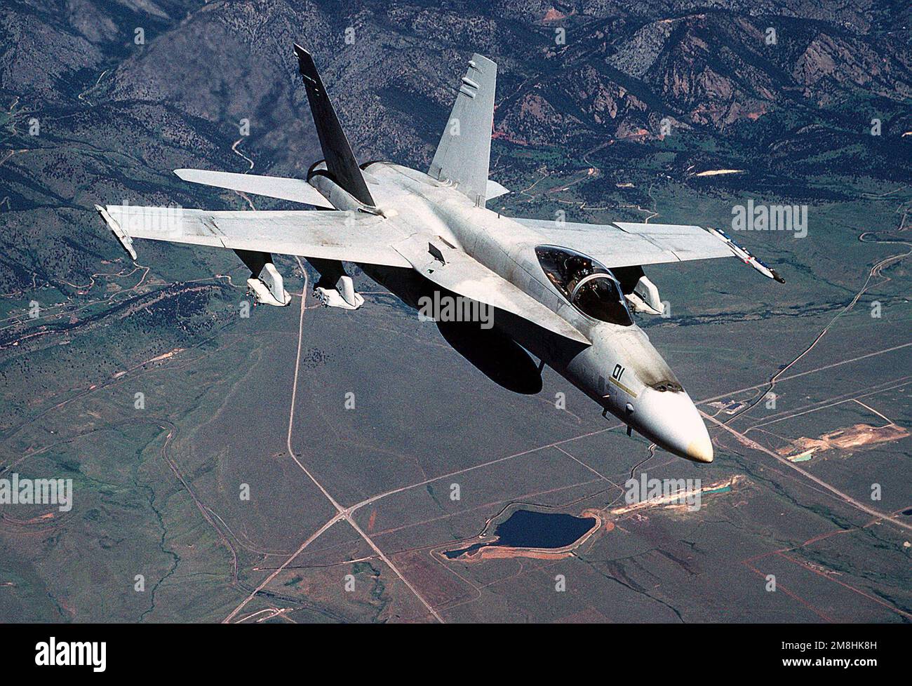 An air-to-air right front view of a Marine Fighter Attack Squadron 321 ...