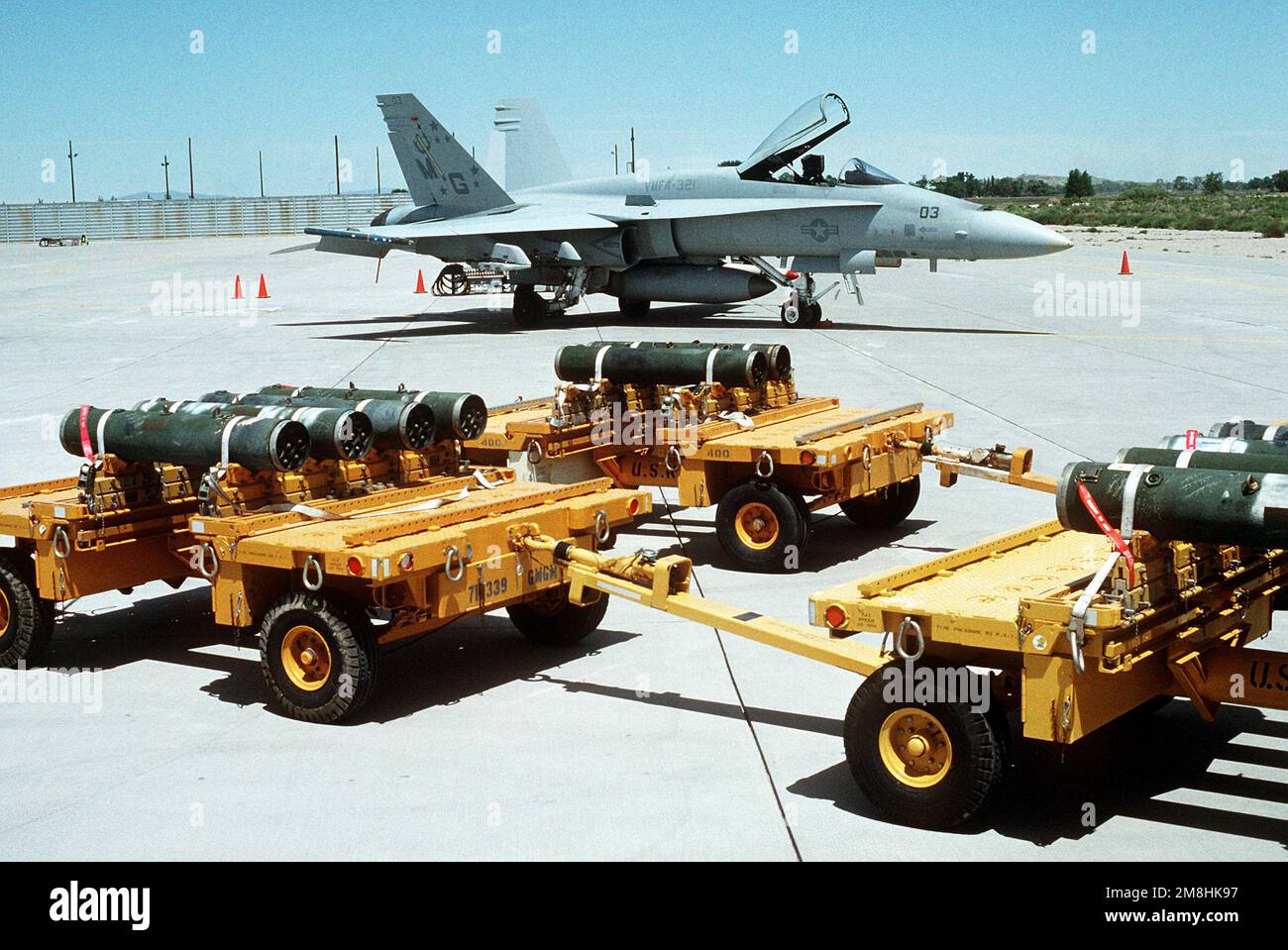 K-4 munitions trailers carrying LAU-68 2.75-inch rocket pods are parked ...