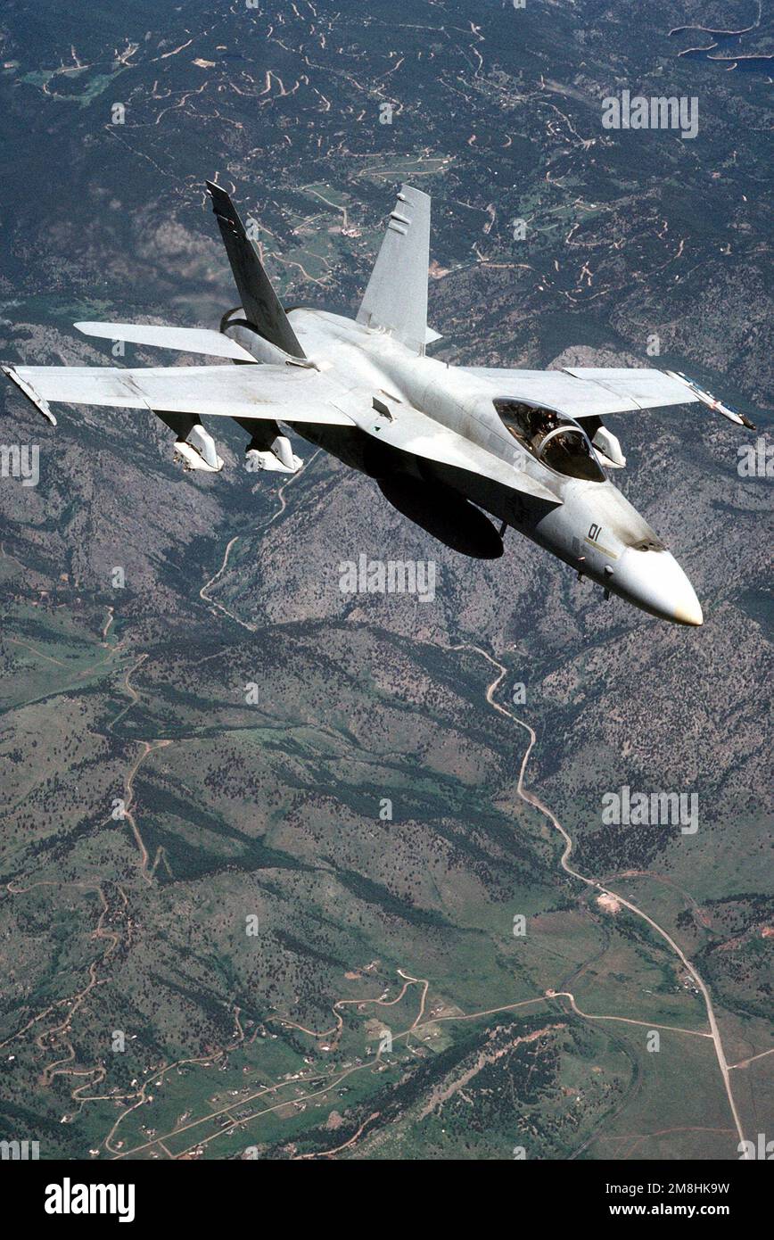 An air-to-air right front view of a Marine Fighter Attack Squadron 321 ...