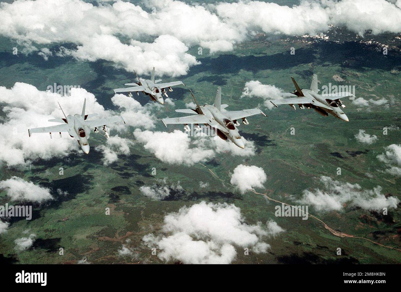 An air-to-air front view of a Marine Fighter Attack Squadron 321 (VMFA ...