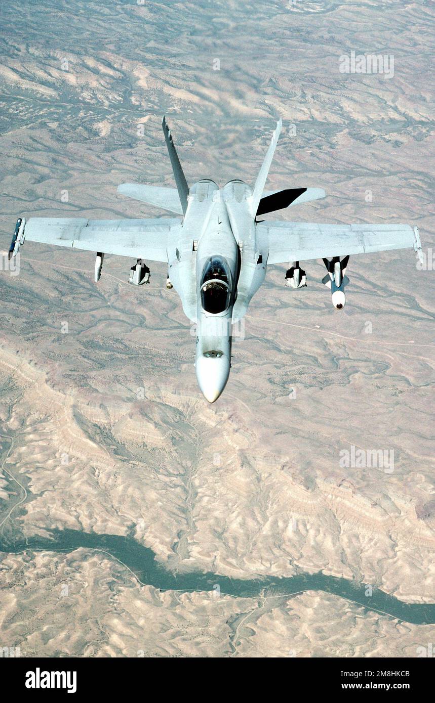 An air-to-air front view of a Marine Fighter Attack Squadron 321 (VMFA ...