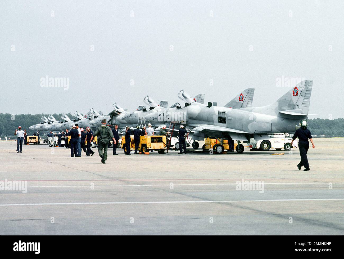 Ground crew members use NC-8A mobile powerplants to service A-4F ...