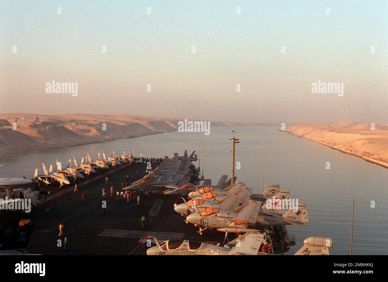Aircraft line the bow section of the nuclear-powered aircraft carrier ...
