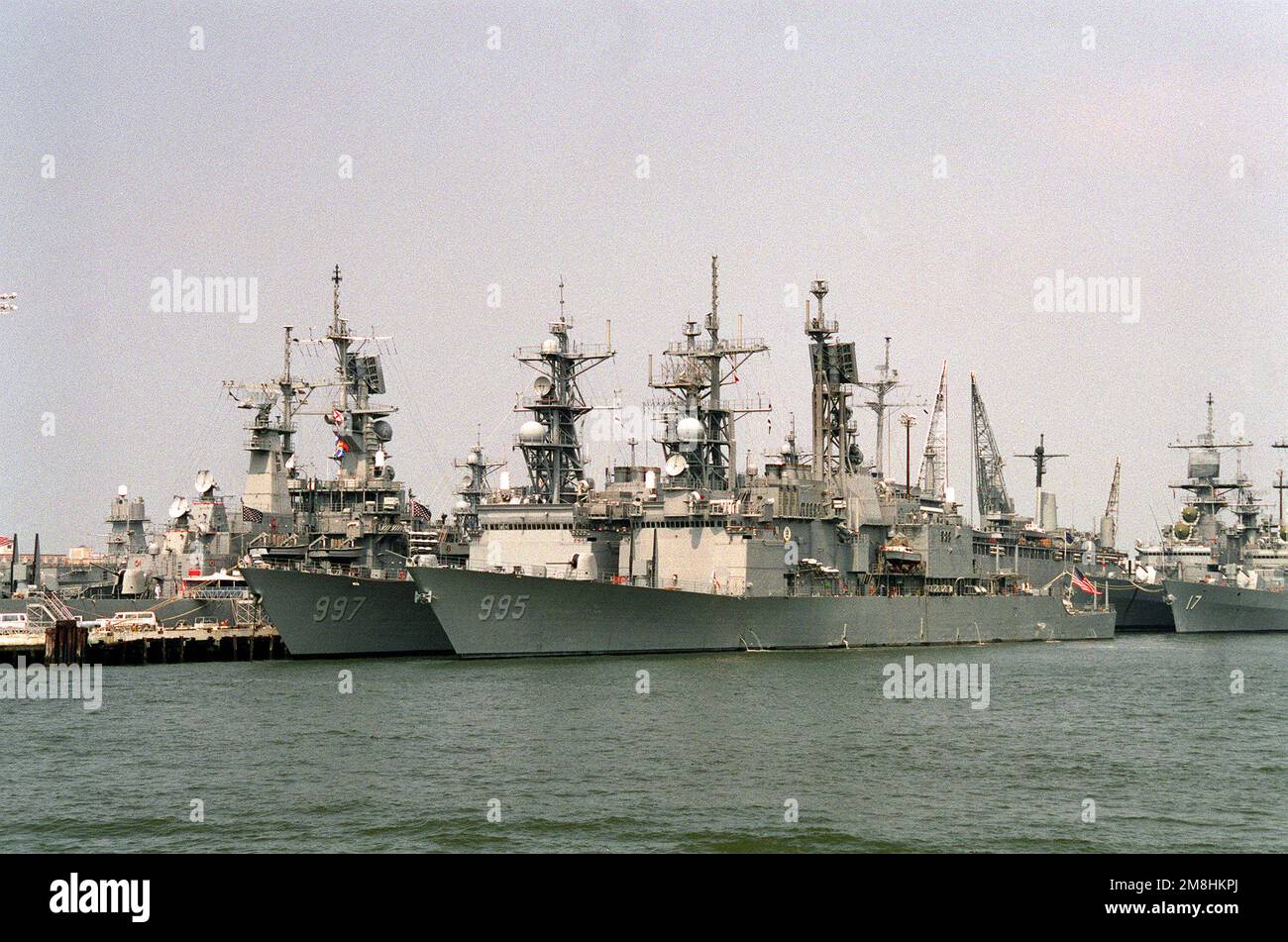 A port bow view of the destroyer USS HAYLER (DD-997) and the guided ...