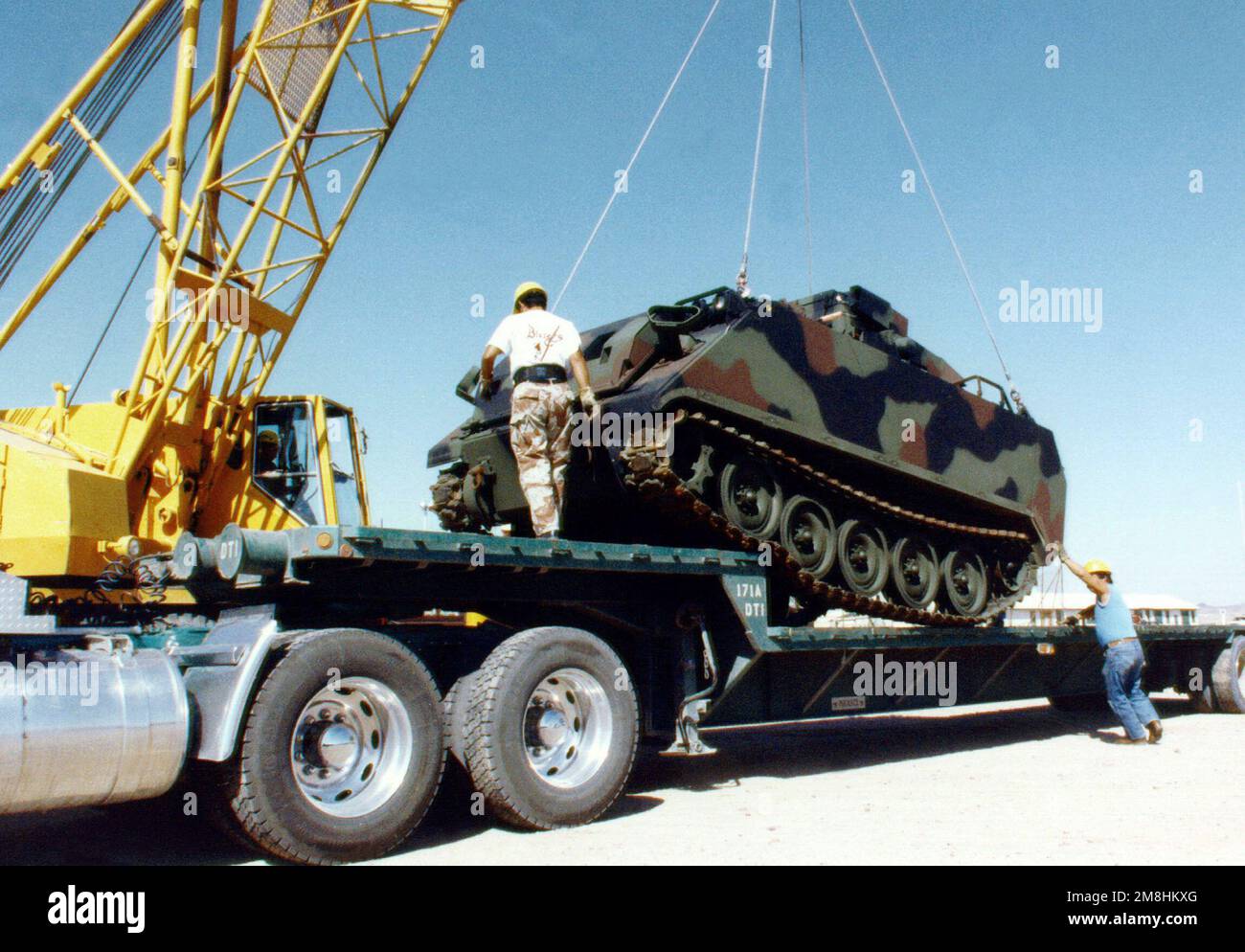 Yermo Annex. An armored M58 Smoke Generator Carrier is loaded onto a ...