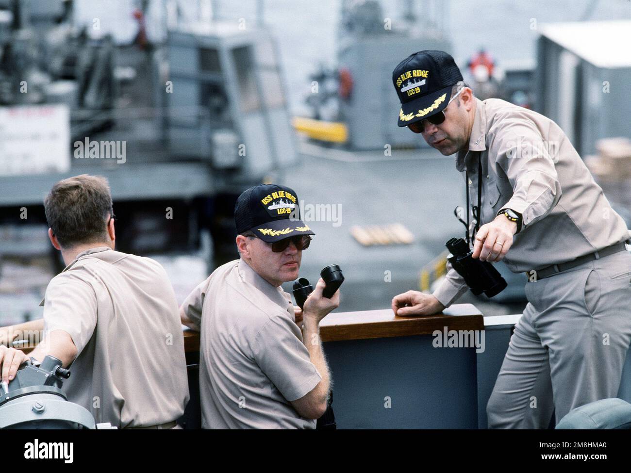 CAPT. A.L. Heisig, right, commanding officer, and CMDR. S. Markey ...