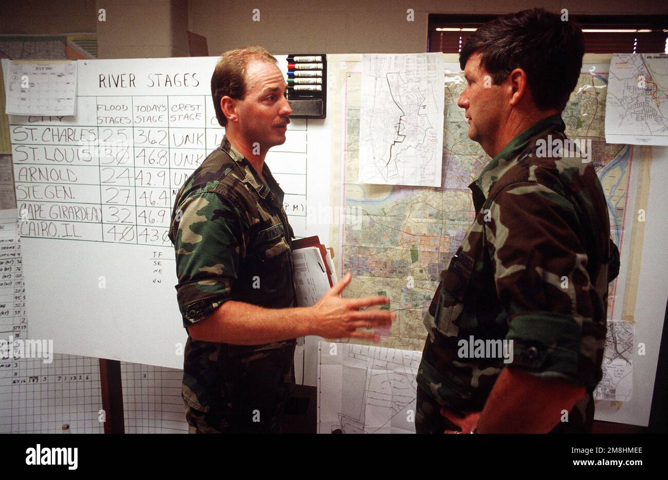 LT. Steven Rynski gives LT. COL. Paul St. Cin from the Army National ...