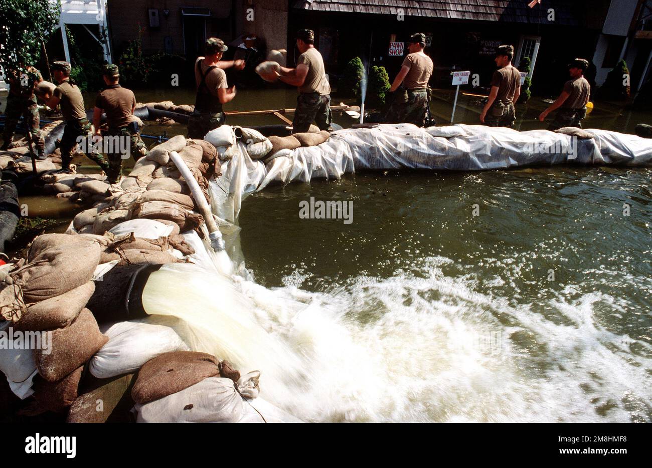 An extensive sandbagging and pumping operation are ongoing by the ...
