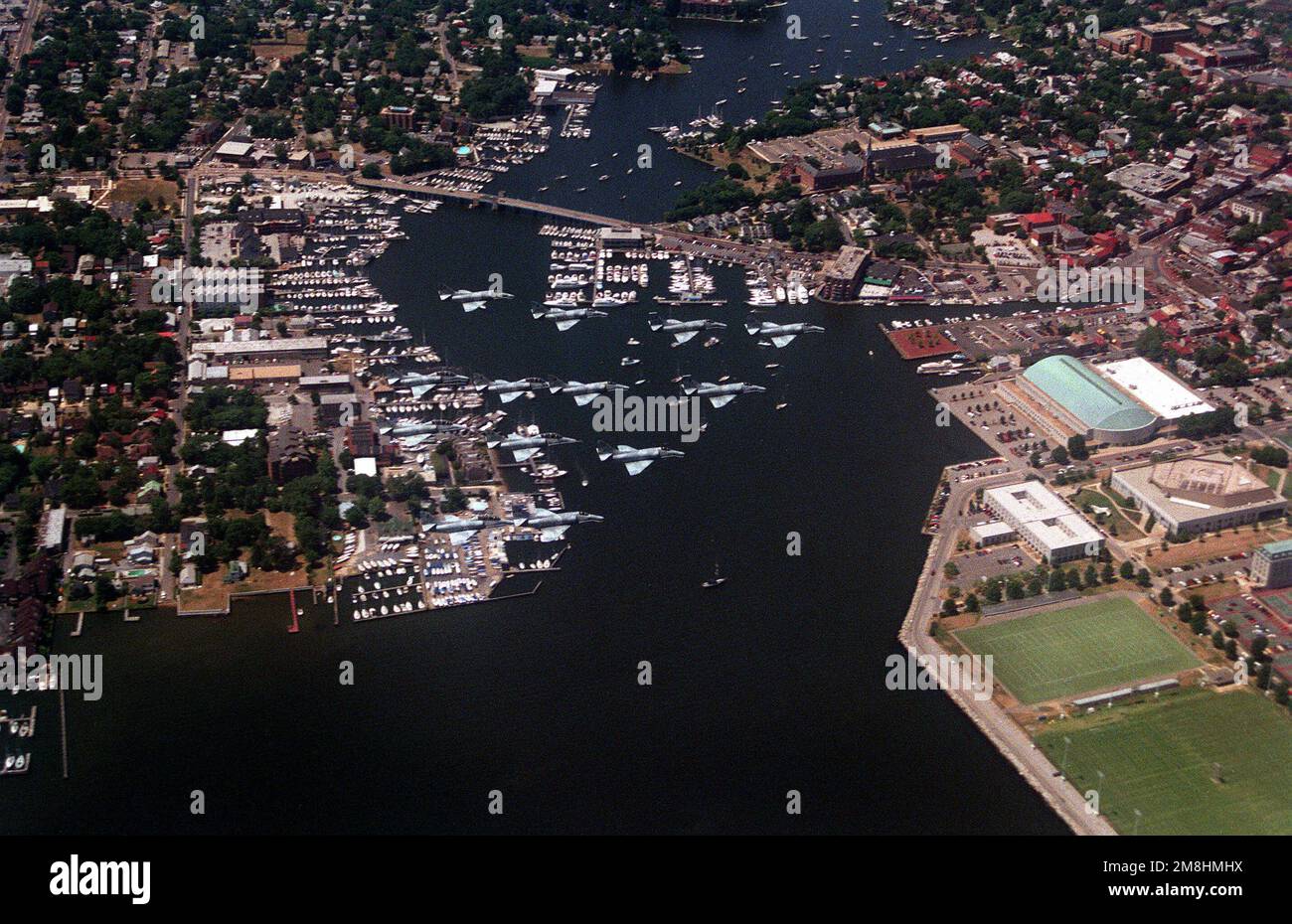 Thirteen A-4J Skyhawk aircraft of Fighter Squadron 43 (VF-43) fly over ...
