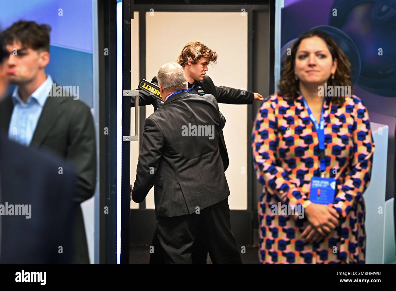 WIJK AAN ZEE - Magnus Carlsen (Norway) is scanned upon entry during the ...