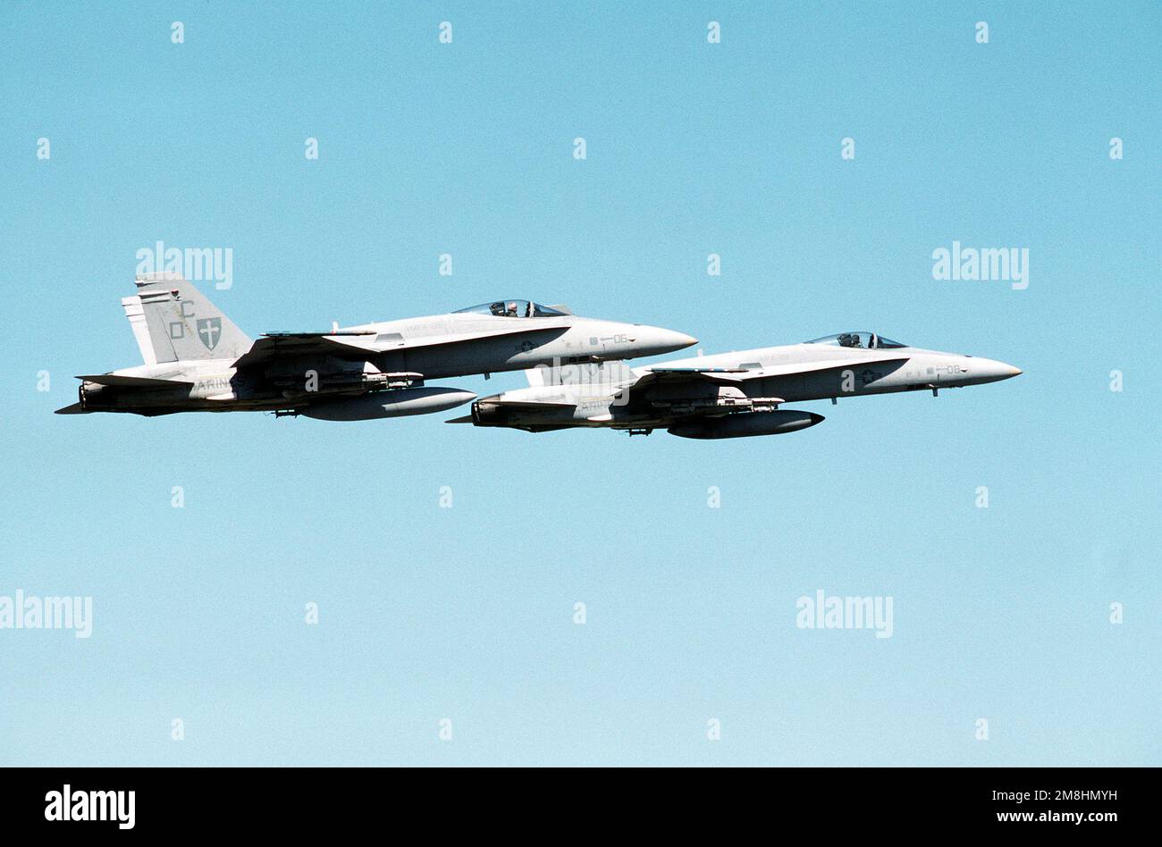Air to air right side view of two F/A-18 Hornet aircraft of Marine ...