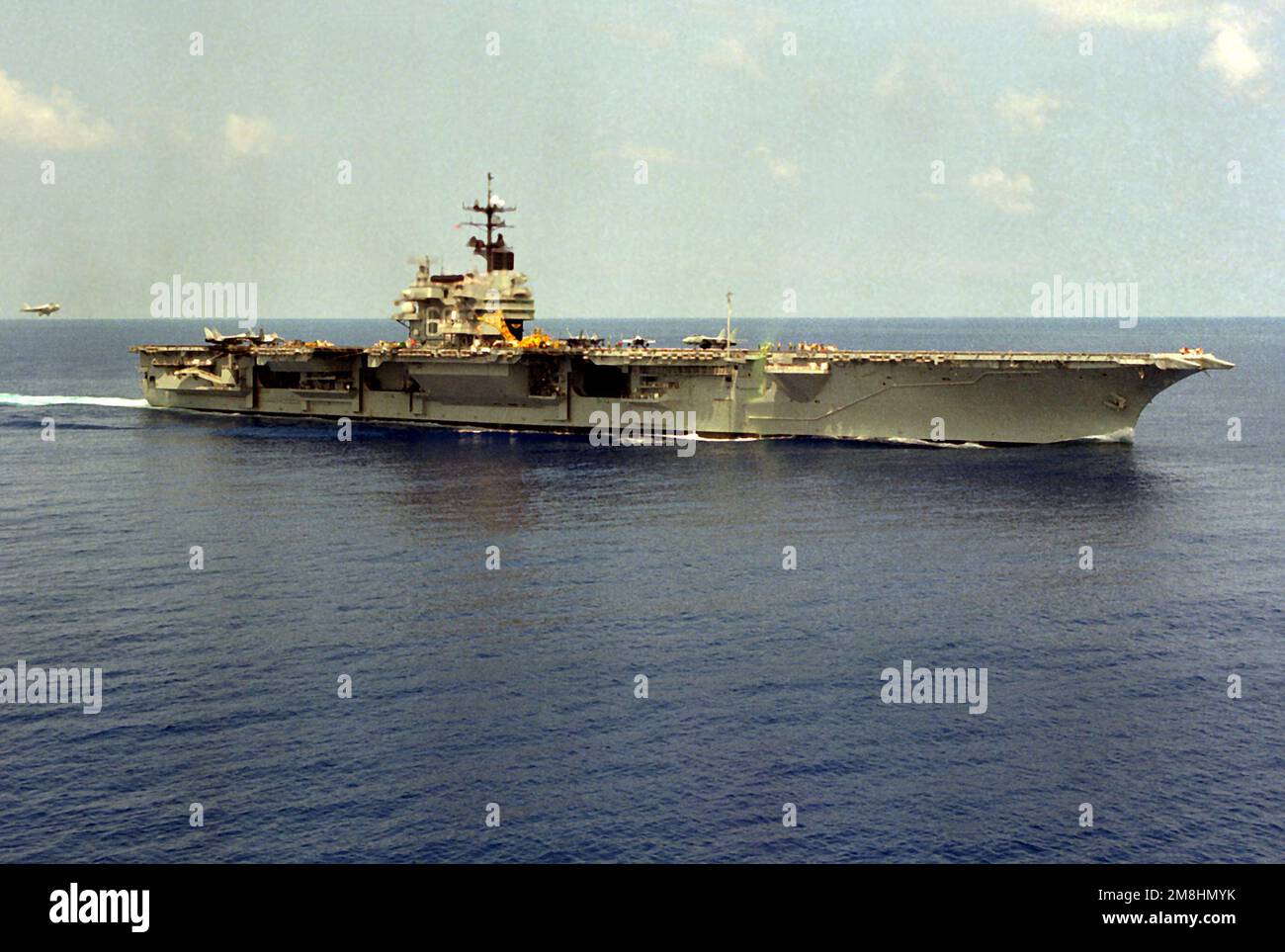 A starboard view of the aircraft carrier USS SARATOGA (CV-60) underway ...
