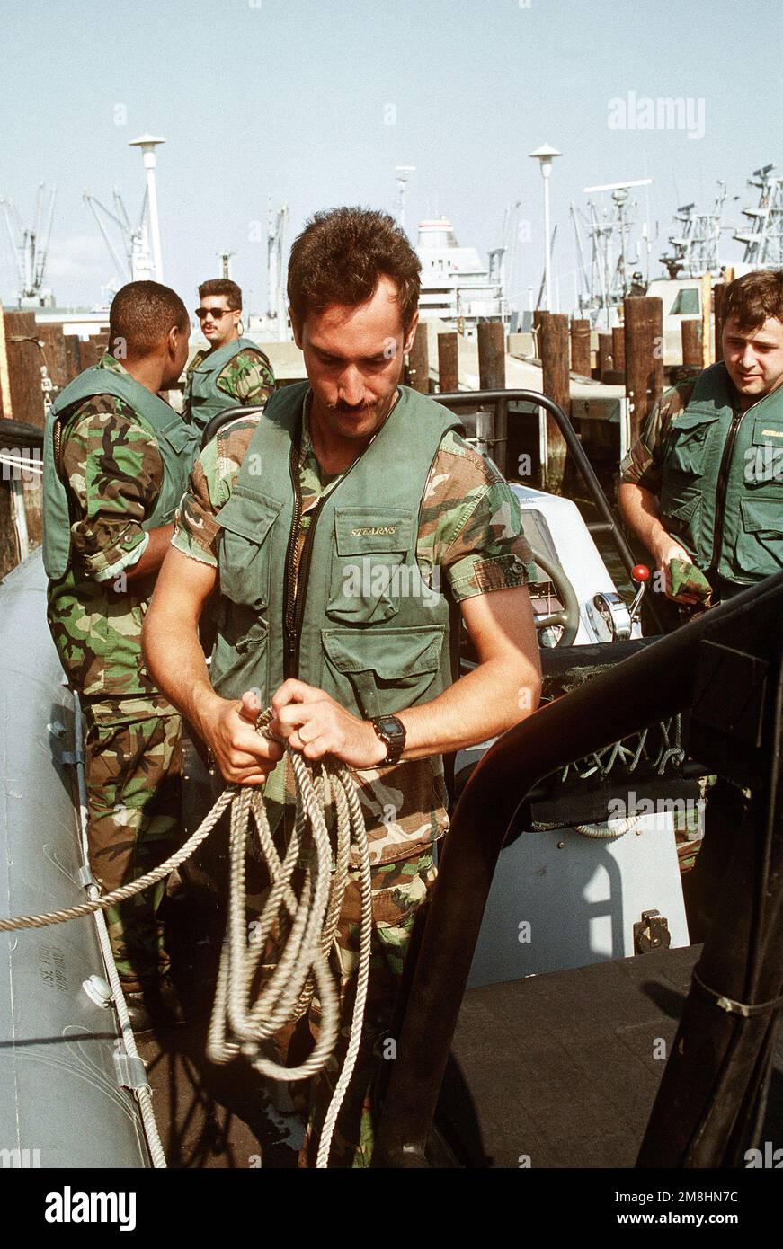Electronic Technician Third Class (ET3) Carl Osborne of Small Boat Unit ...