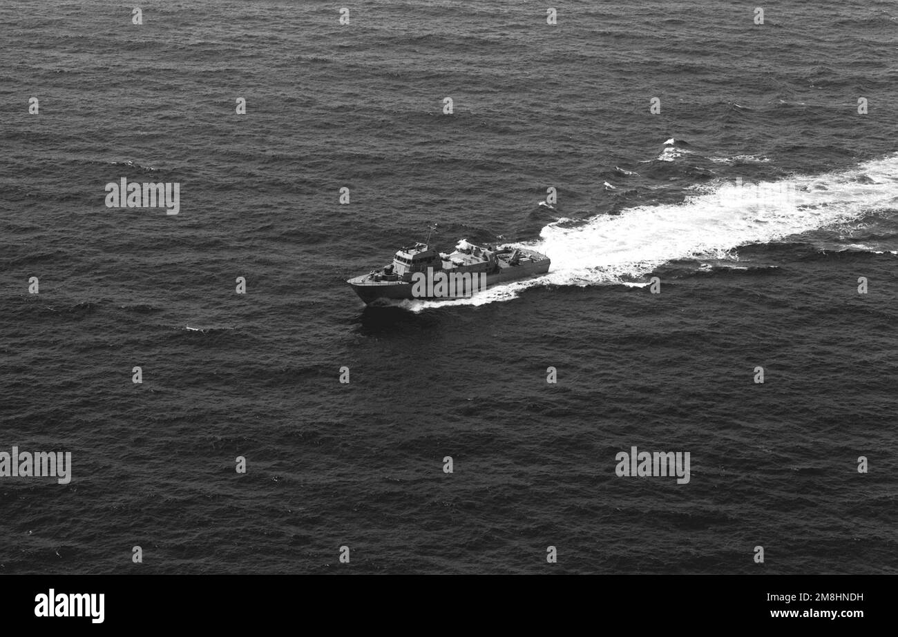 A port bow view of the Iranian Navy Hendijan class armed auxiliary ...