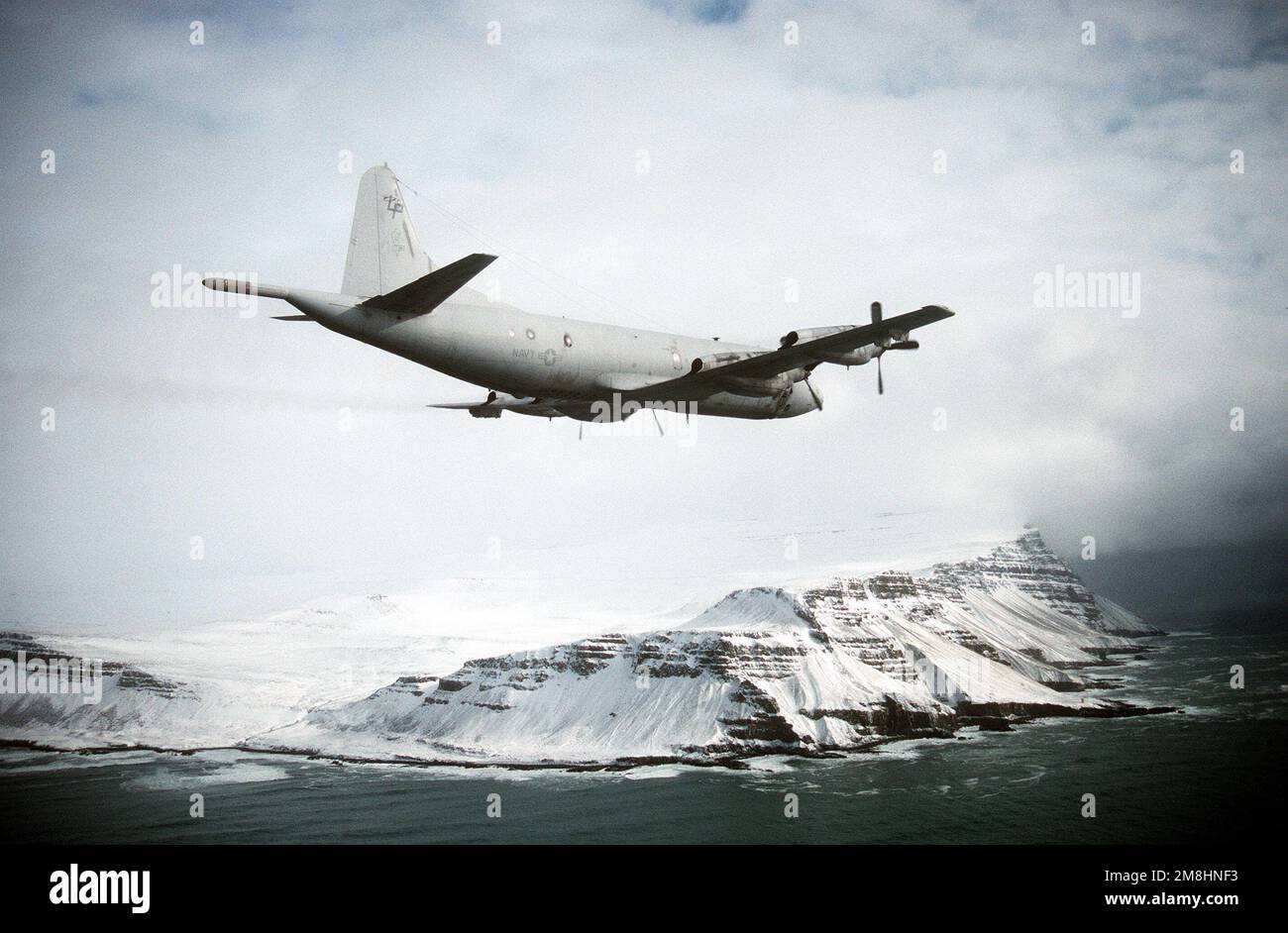An air-to-air side view of a of P-3C Orion aircraft from Patrol ...