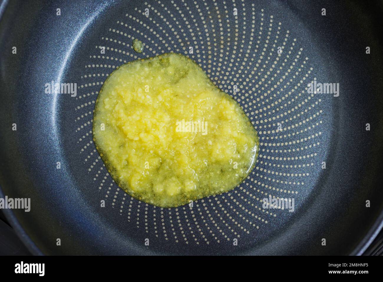 Hot pan melting butter hi-res stock photography and images - Alamy