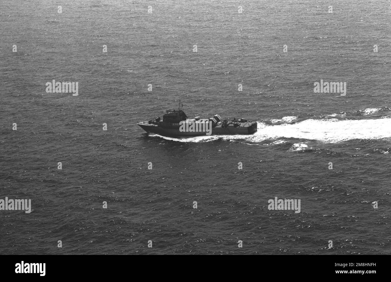 A port beam view of the Iranian Navy Hendijan class armed auxiliary ...