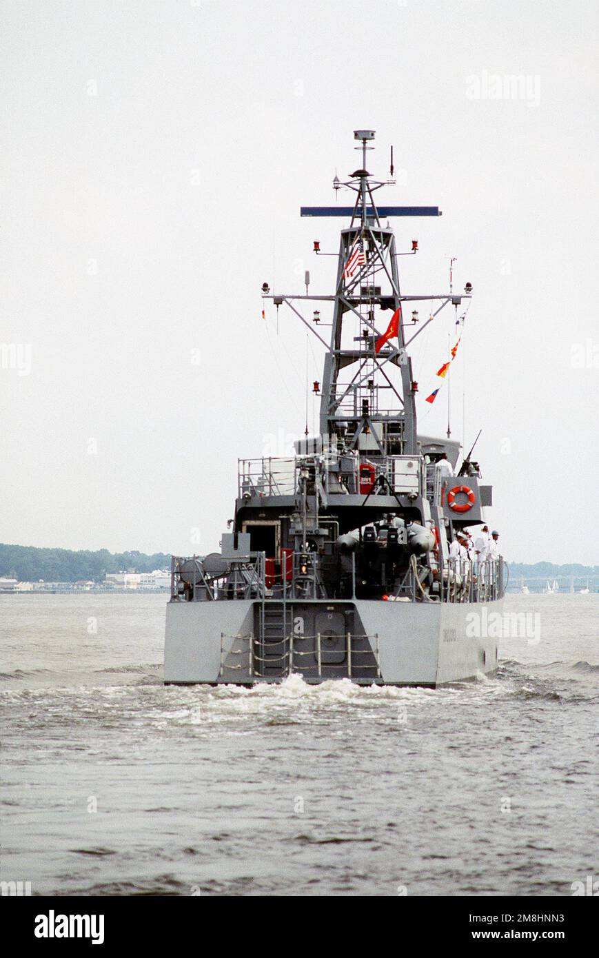 A stern view of the coastal patrol ship USS CYCLONE (PC-1) underway ...