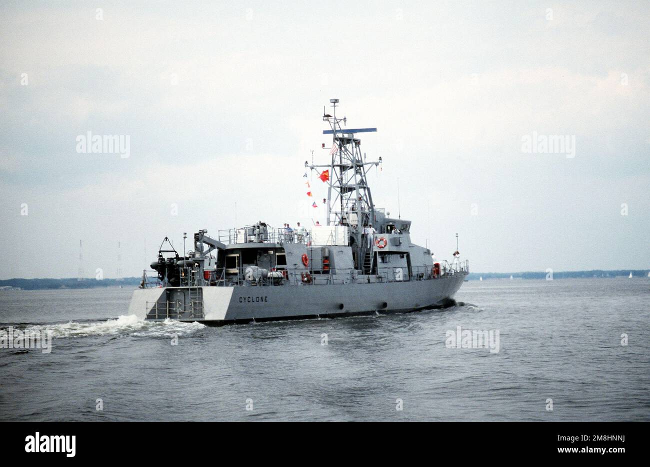 A starboard quarter view of the bridge and mast of the coastal patrol ...