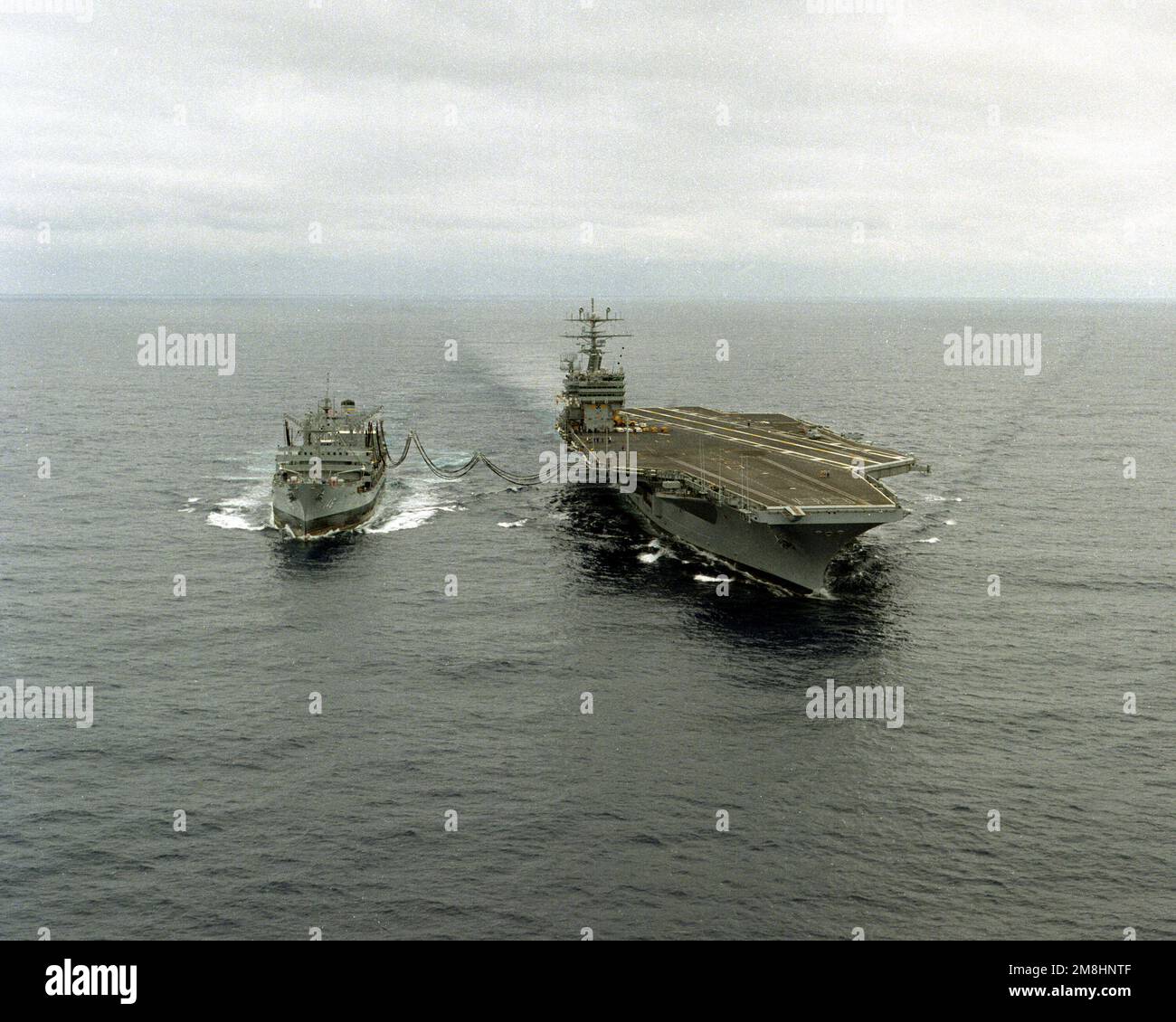 A bow view of the nuclear-powered aircraft carrier USS NIMITZ (CVN-68 ...