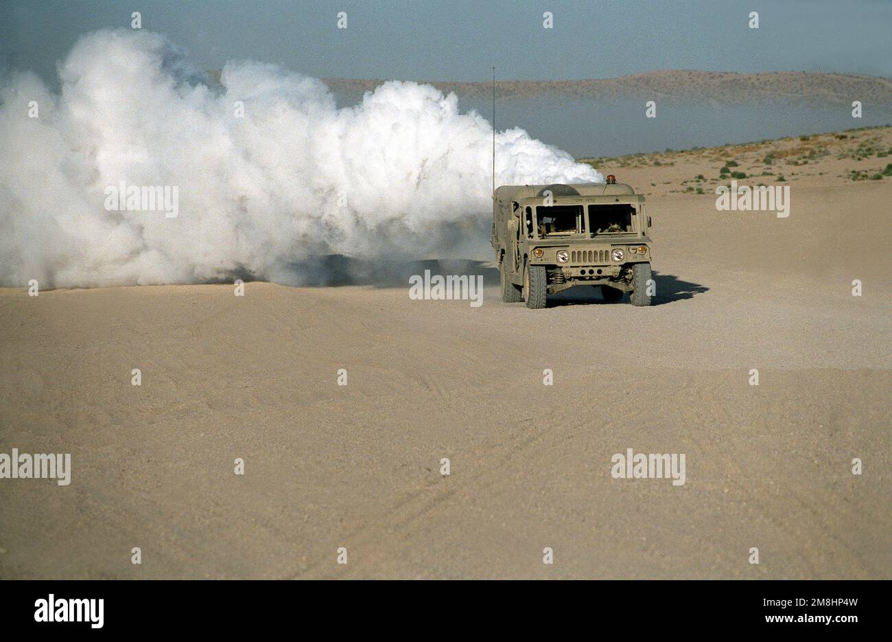 A High-Mobility Multipurpose Wheeled Vehicle (HMMWV), modified as a ...