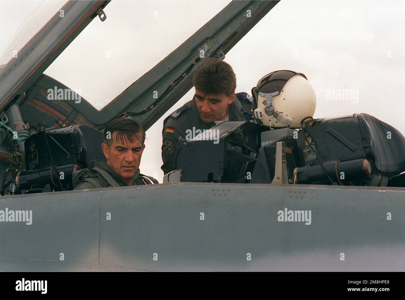 German pilot, MAJ. Gassner, explains operational controls of the MIG-29 ...