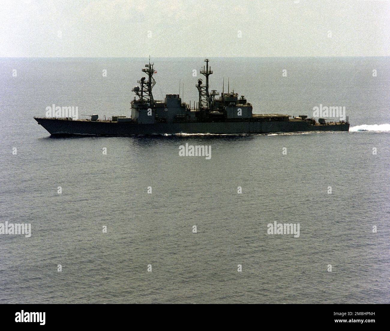 A port beam view of the destroyer USS CONOLLY (DD-979) underway ...