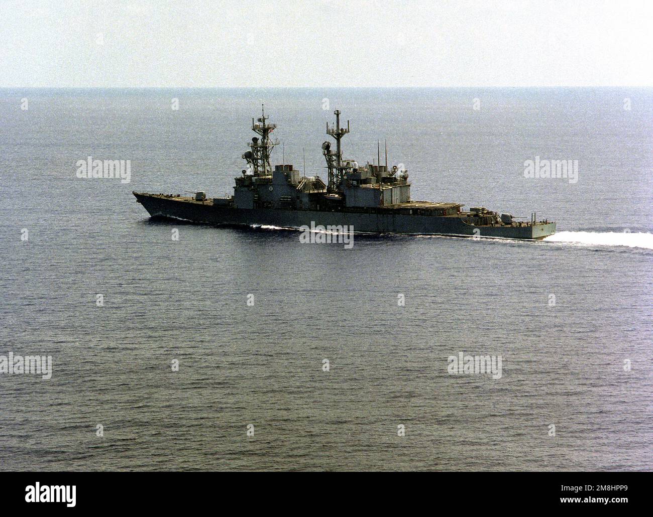 A port quarter view of the destroyer USS CONOLLY (DD-979) underway ...