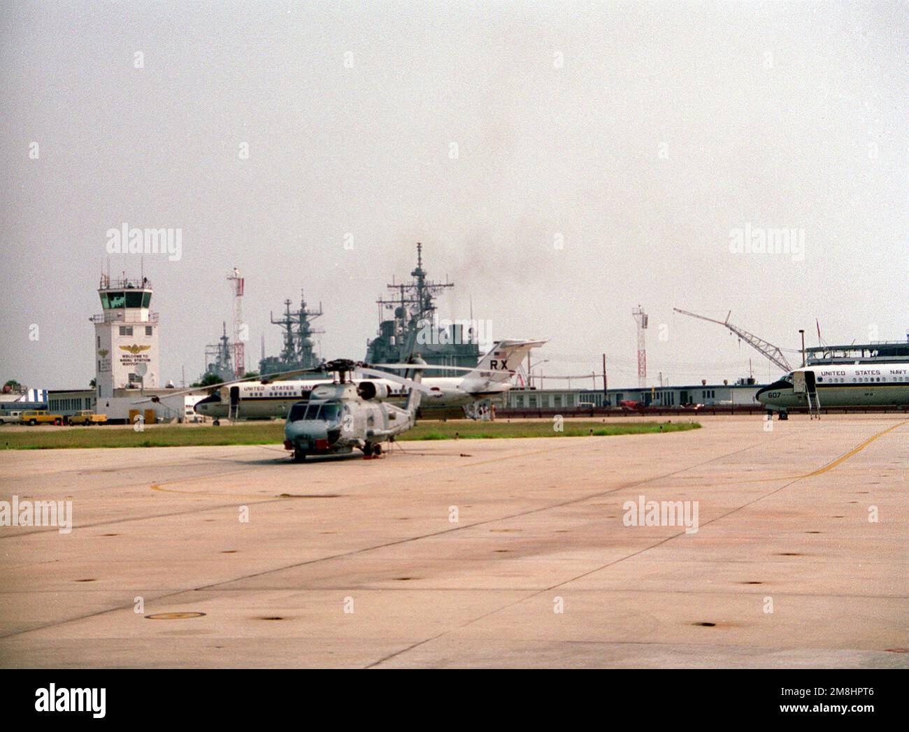 A left front view of an SH-60B Sea Hawk helicopter parked on the flight ...