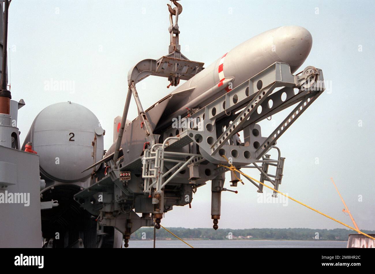 A P-15 SS-N-2c Styx SSM is unloaded from the No. 4 missile tube aboard ...