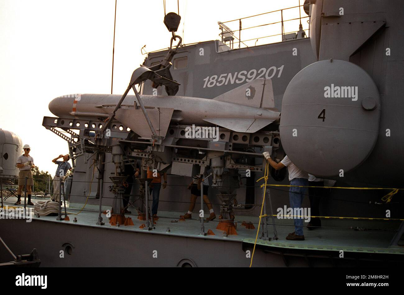 A P-15 SS-N-2c Styx SSM is unloaded from the No. 4 missile tube aboard ...