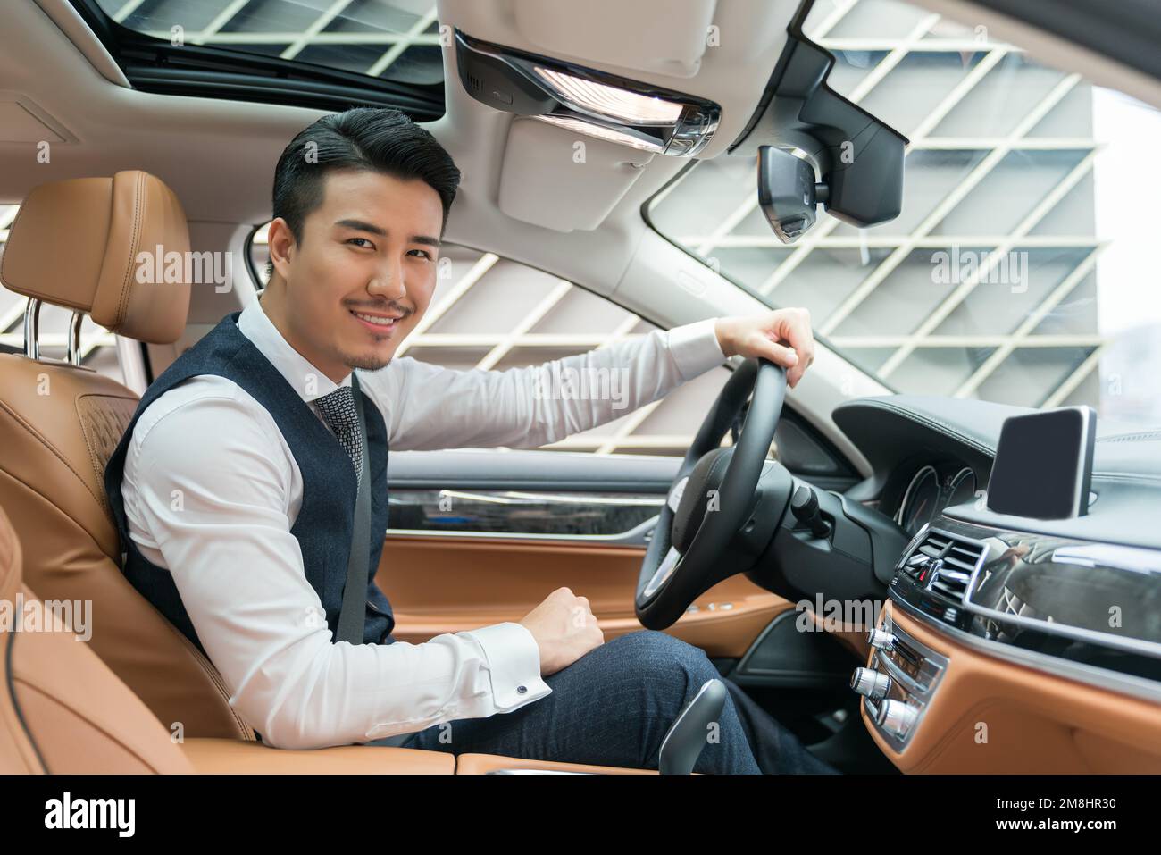 Business men driving Stock Photo - Alamy