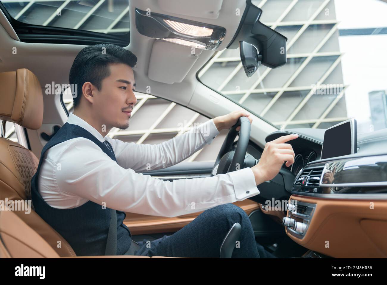 Business men driving Stock Photo - Alamy