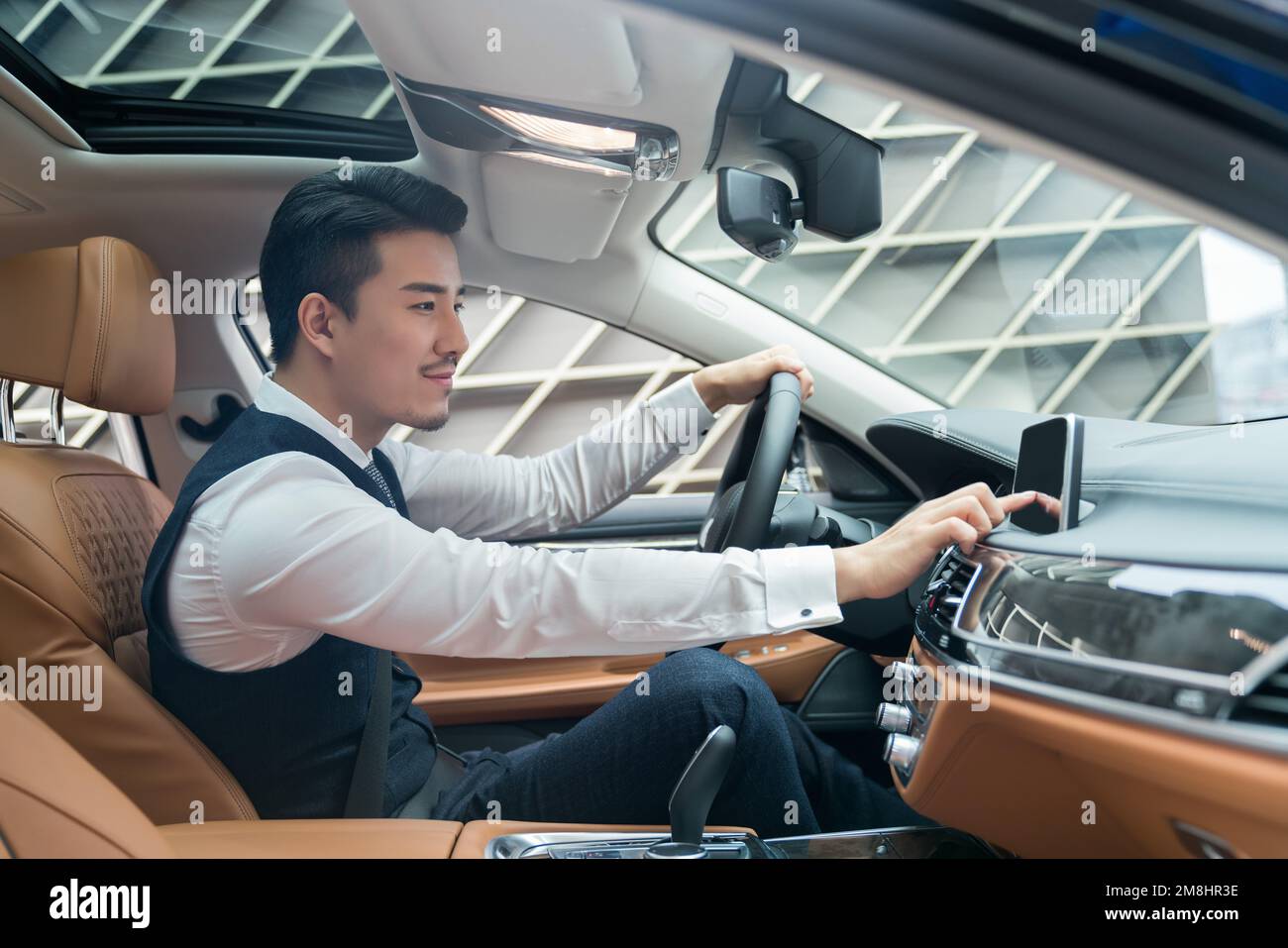 Business men driving Stock Photo - Alamy