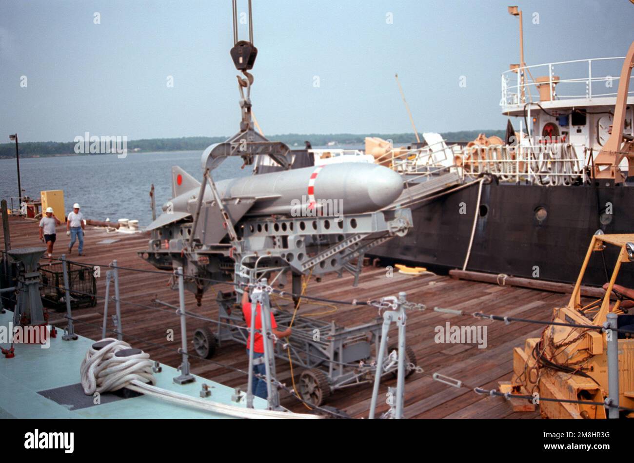 A P-15 SS-N-2c Styx SSM is unloaded from the No. 4 missile tube aboard ...